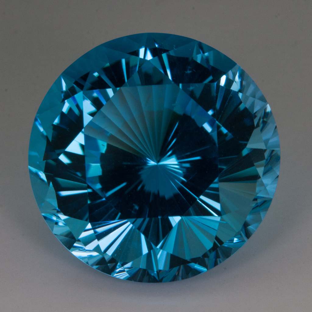 24 98 Carat Blue Topaz Natural Round Fancy Cut 18mm Brazil 24 98 Carat Blue Topaz Natural Round Fancy Cut 18mm Brazil